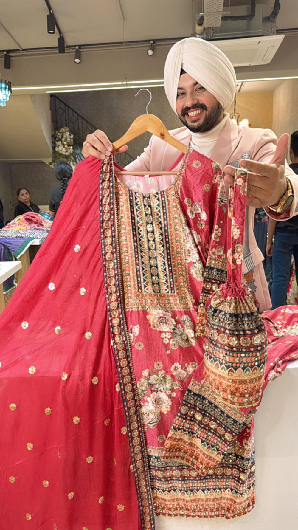 Gajri Pink velvet Heavy Straight suit with embroidered Potli & Duppata