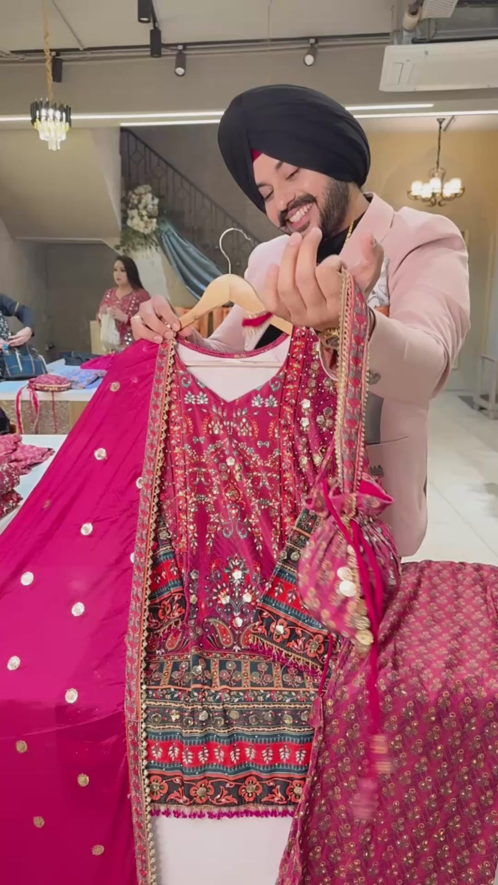 Rani pink Velvet Heavy embroidered Indowestern Suit with Plazo & Potli